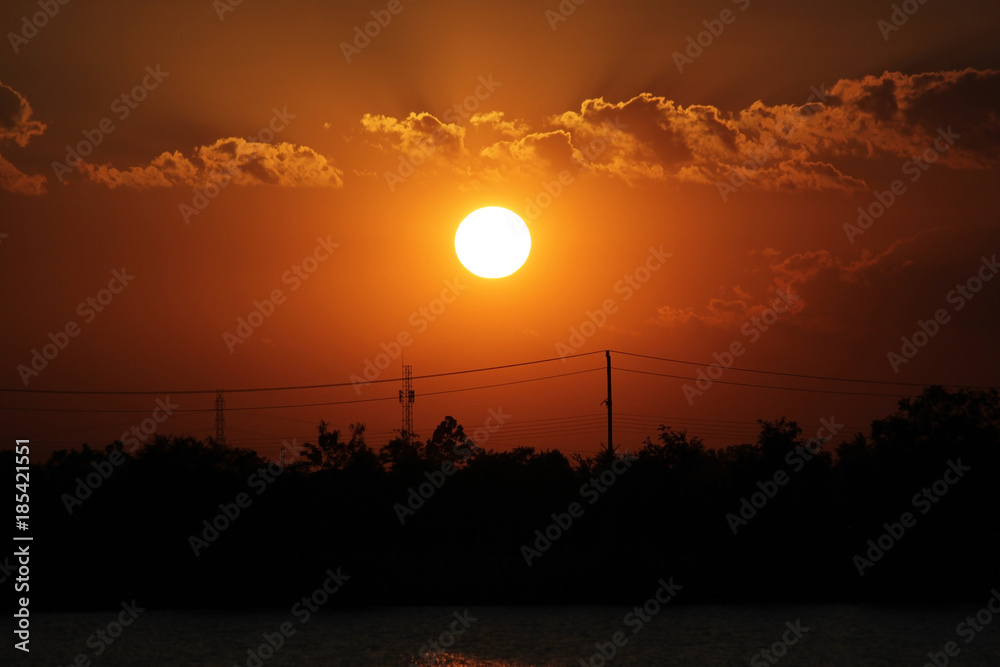 big bright sun on sky background Stock Photo | Adobe Stock