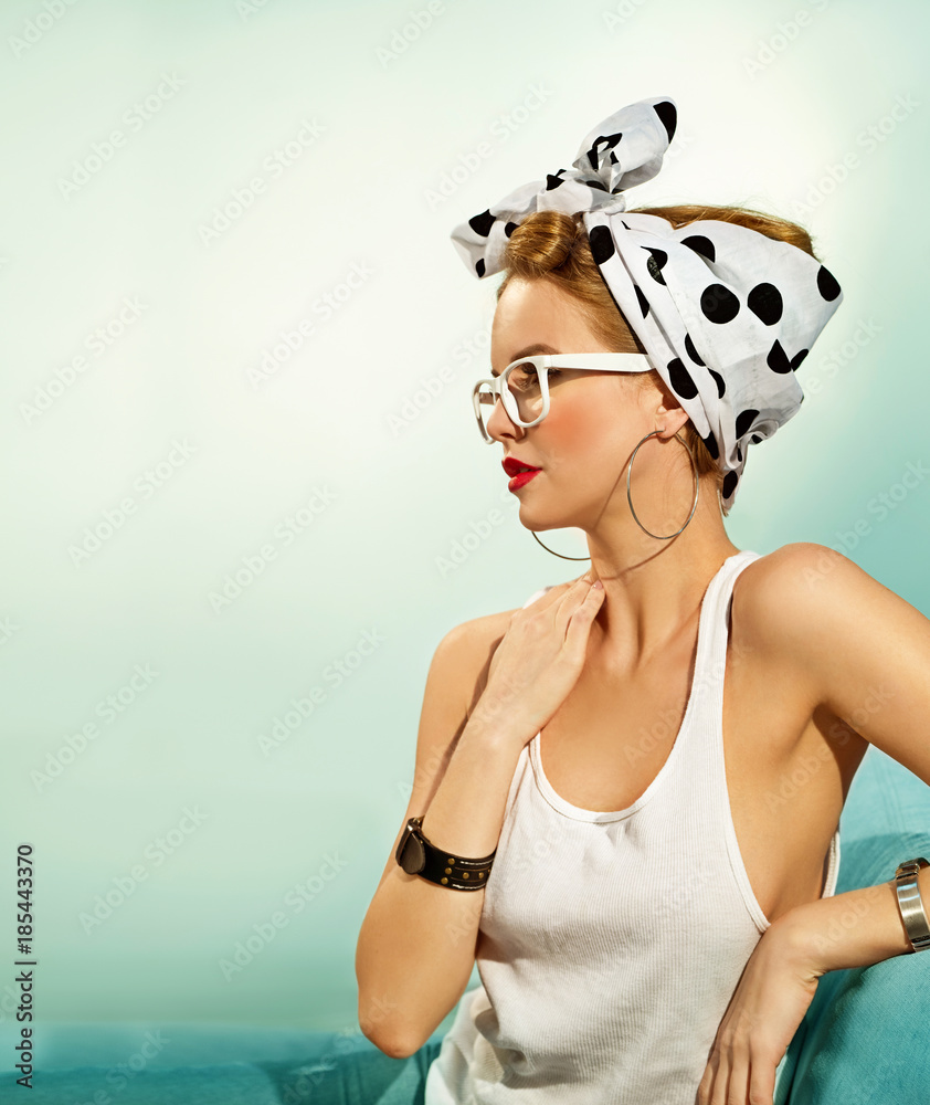 Pin-up girl sitting on the sofa Stock Photo | Adobe Stock