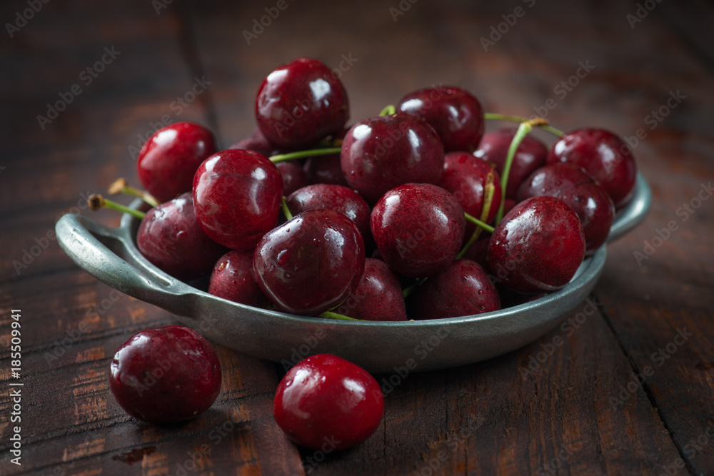 Red Cherries In A Bowl
