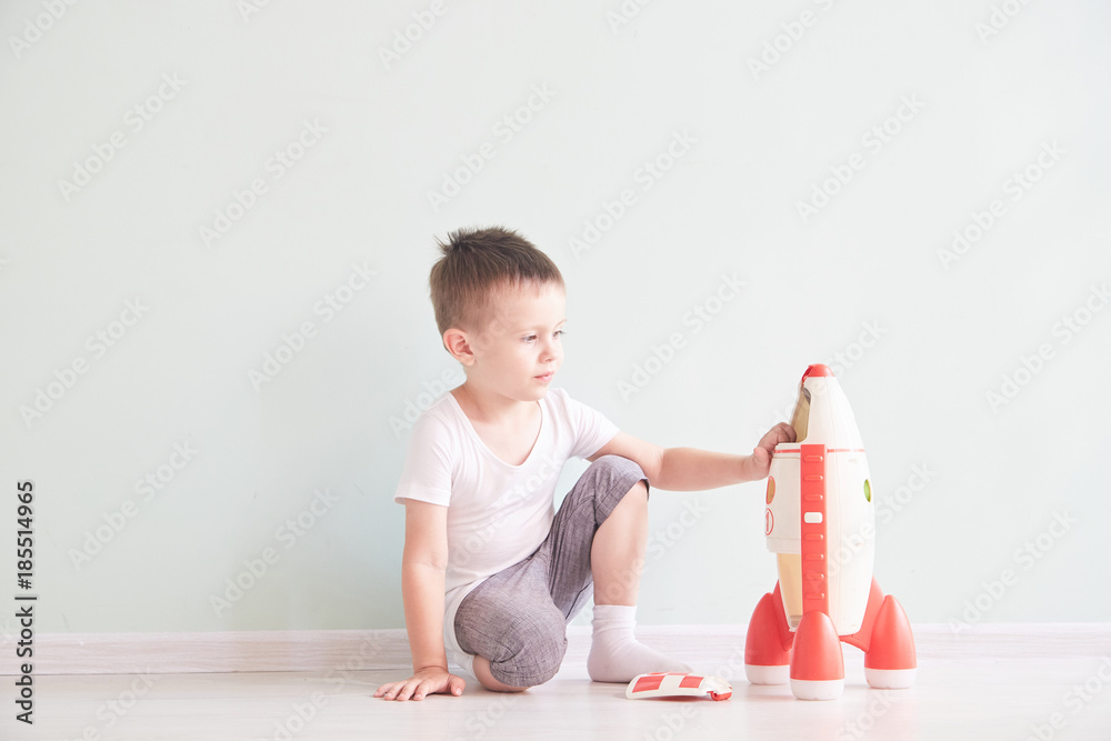 Active little boy playing the rocket toys, Child showing rocket toy ...