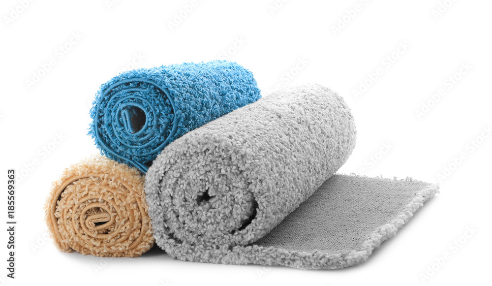 Rolled colorful carpet on white background Stock Photo | Adobe Stock