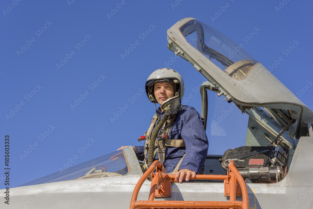 Military pilot in the cockpit of a jet aircraft Stock Photo | Adobe Stock