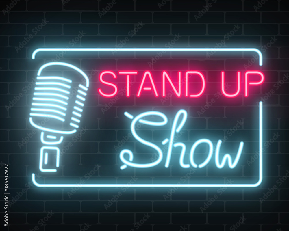 Neon stand up show sign with retro microphone on a brick wall ...