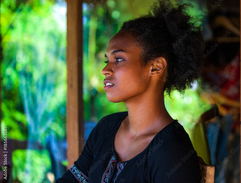 Melanesian pacific islander, beautiful girl with afro, half profile ...
