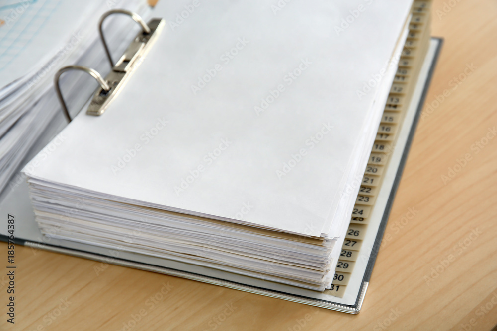 Folder with documents on table Stock Photo | Adobe Stock
