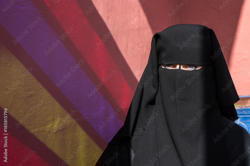 Arab woman with face covered with black niqab Stock Photo | Adobe Stock