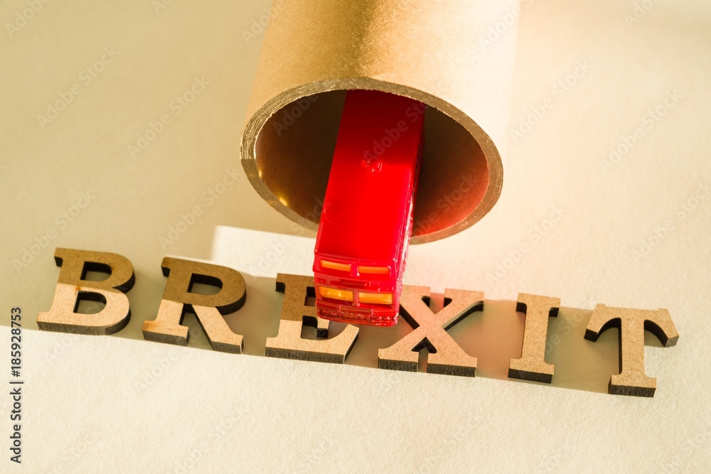 Brexit word abstract in vintage letters, background double decker bus ...
