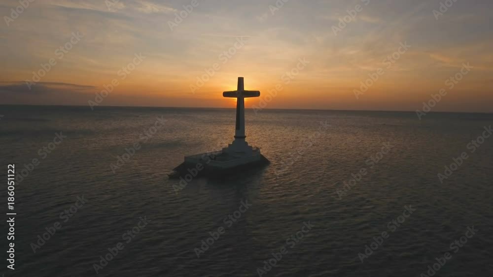 Aerial view Sunken Cemetery cross at sunset in Camiguin Island ...