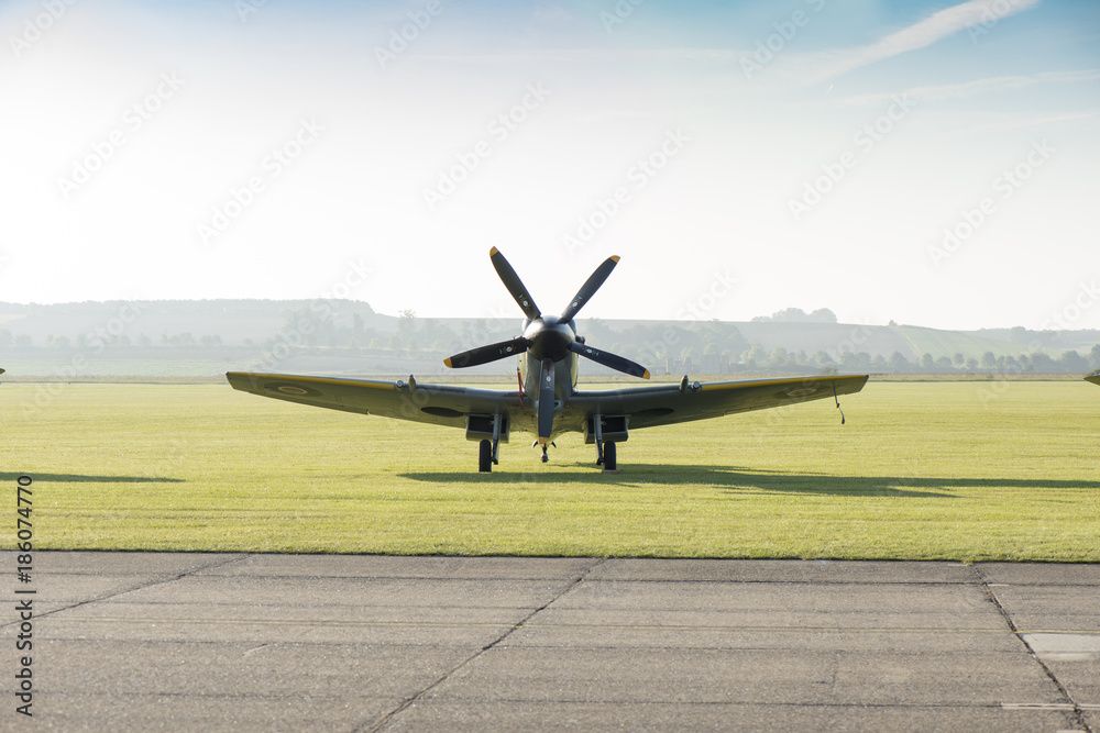 Front View of Classic Spitfire Aircraft by a Runway Stock Photo | Adobe ...