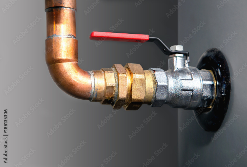 Copper pipes, copper connector and valve with a red handle Stock Photo ...