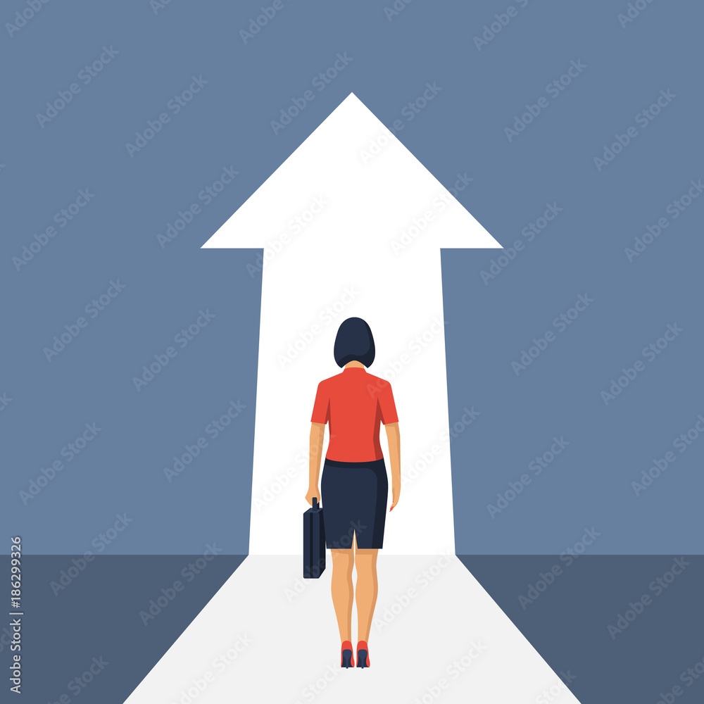 Way forward concept. Businesswoman in suit stands in front of an arrow ...