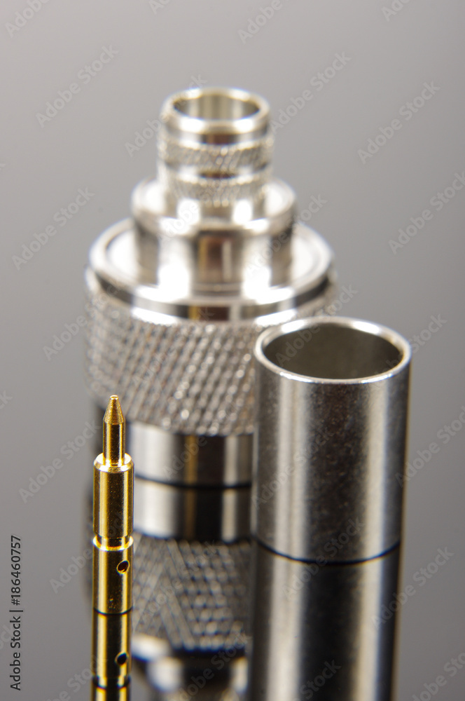 Coaxial cable connector assembly accessories isolated on the black ...