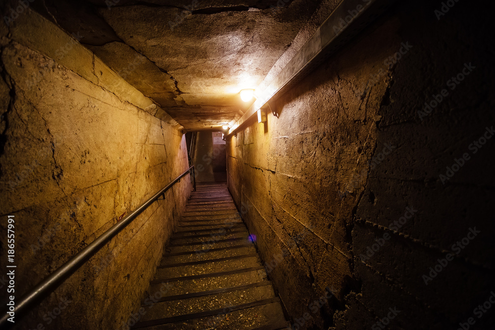 Foto de Dark corridor of old underground Soviet military bunker under ...