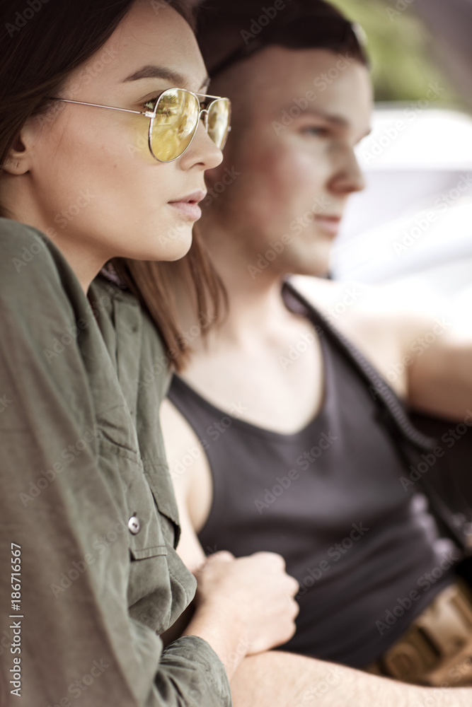 Sexy woman and man who drive a car. Stock Photo | Adobe Stock