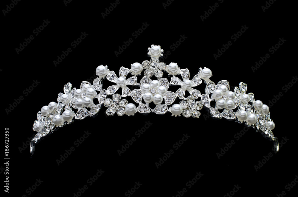 tiara with pearls isolated on a black background Stock Photo | Adobe Stock