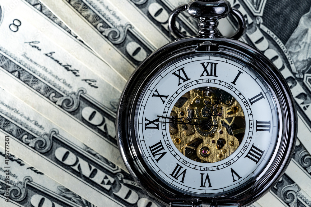 Time is money with vintage pocket watch on US dollar banknotes using as ...