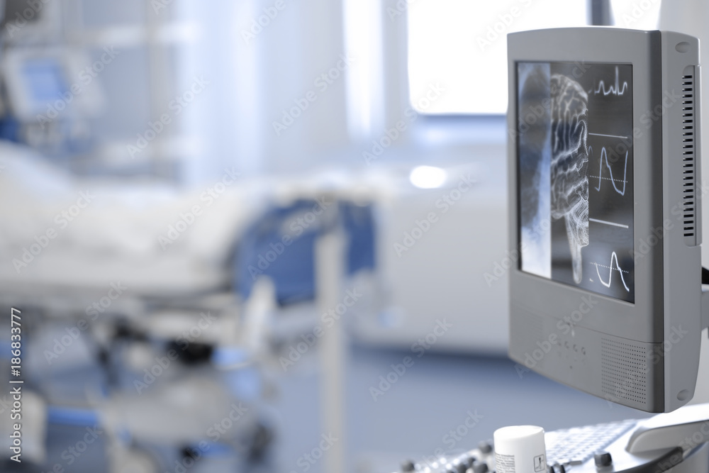 Medical test results depicted on the computer monitor in the patient's ...