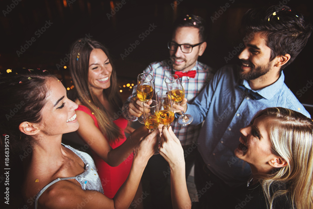 Group of people having a party Stock Photo | Adobe Stock