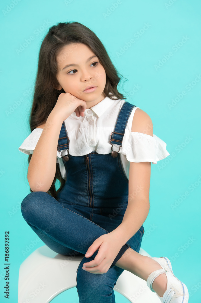 Preteen model with thinking face on blue background Stock Photo | Adobe ...