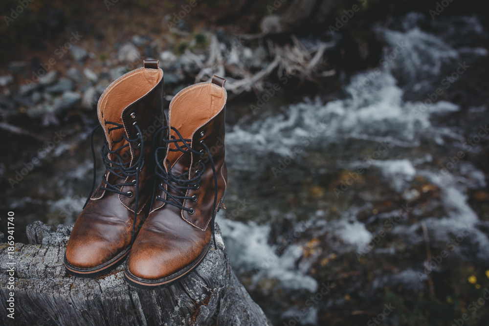 Travel tourist set is boots on wood with background river Stock Photo ...