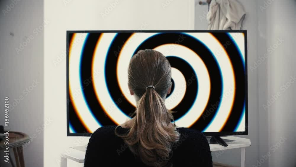 Girl Watching TV Gets Hypnotized With Images, Zoom In. Zoom In young ...