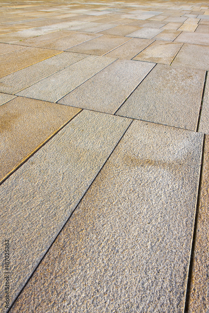 New paving made with stone blocks of rectangular shape in a pedestrian ...
