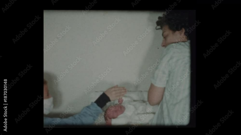 1959 Mother and son change newborn baby diapers Stock Video | Adobe Stock