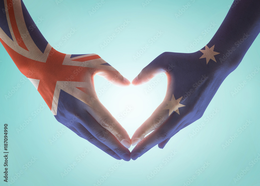 Australia national flag on people hands in heart shape isolated on sky ...