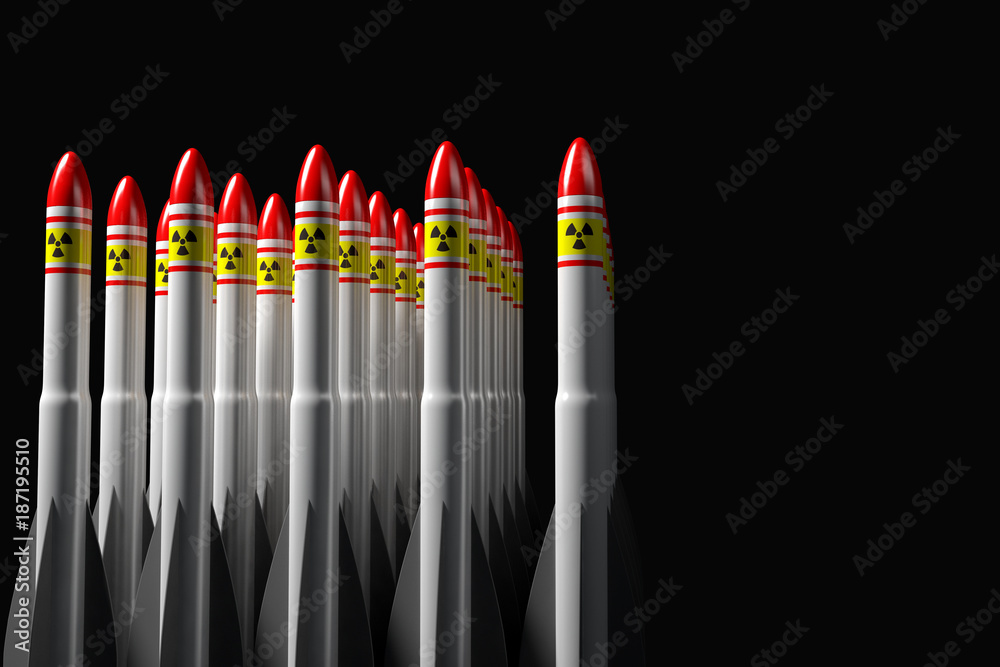 Combat rockets with the symbols of the atomic weapon displayed in a row ...