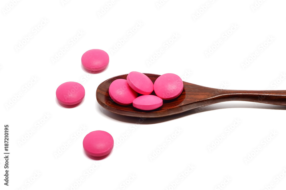 Top view of pink ibuprofen pills on white background for healthcare and ...