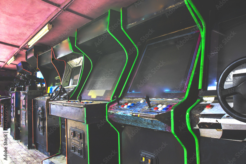 Old used classic forgotten Vintage Arcade in room and none of players ...