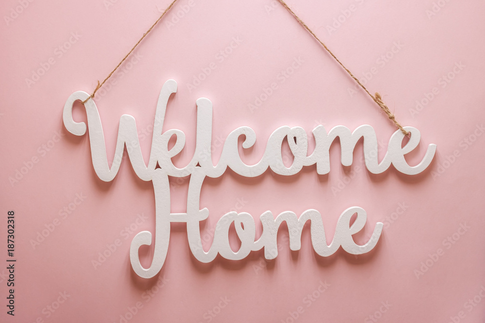 welcome home white words pink background Stock Photo | Adobe Stock
