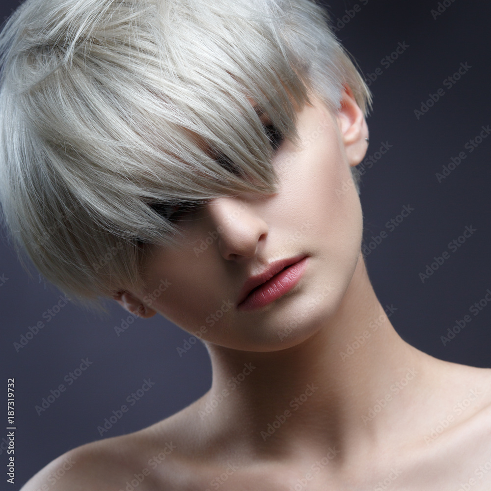 Fashion Beauty Portrait Of A Blonde Girl With A Stylish Short Haircut