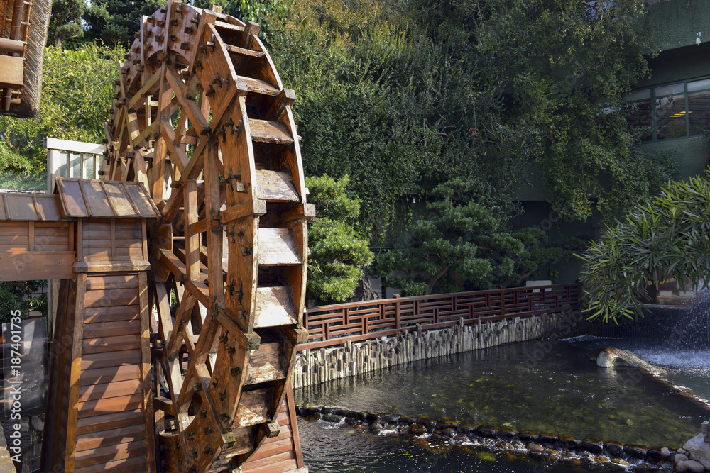 Vintage wooden waterwheel at water mill used to generate power Stock ...