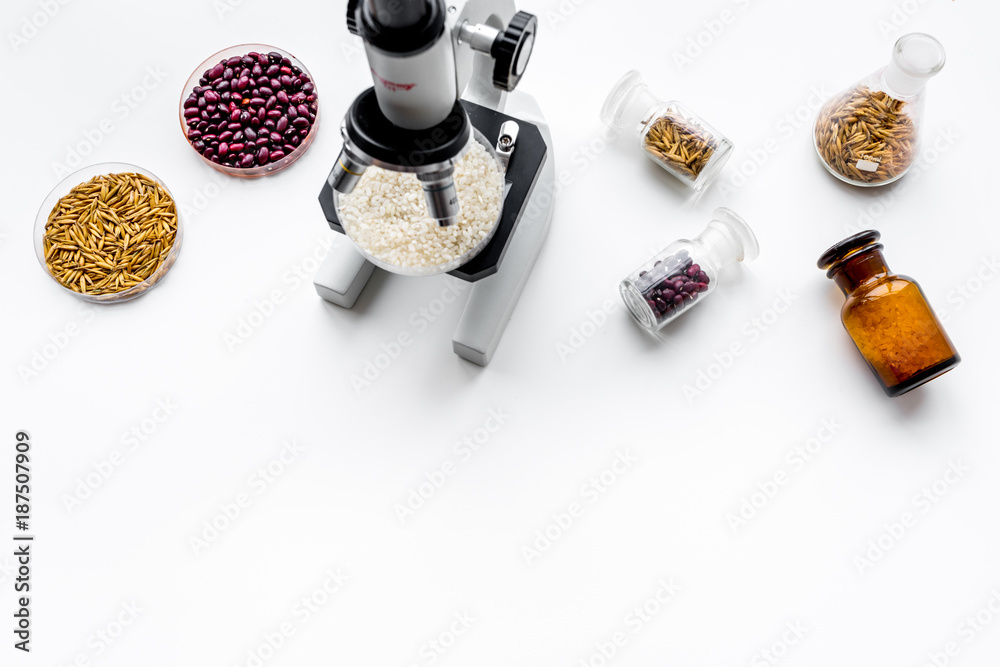 Food analysis. Rice under the microscope on white background top view ...