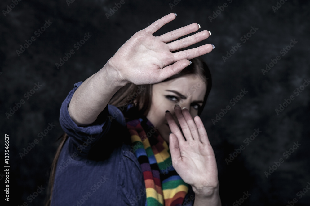 Sad woman scared putting hand in front of face (Gestures, body language ...