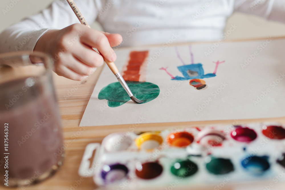Cute little preschooler child drawing at home Stock Photo | Adobe Stock