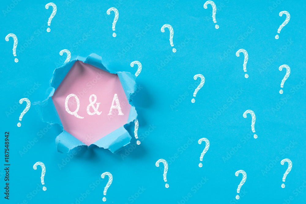 Blue torn paper with question mark revealing Q&A word. Questions and ...