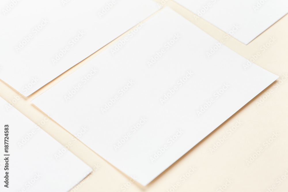 Blank white paper cards on a soft color background, business cards ...
