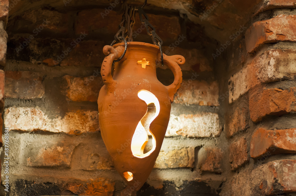 Lamp made from clay pots. Weigh in on the circuit in the window Stock ...