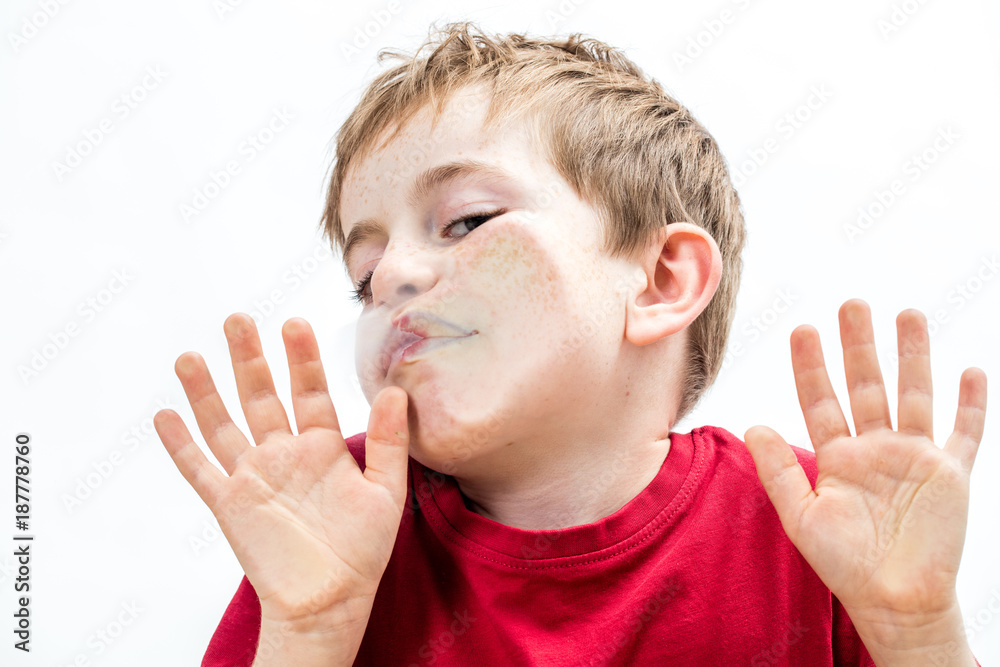 crushed young boy touching his goofy face to a window Stock-Foto ...