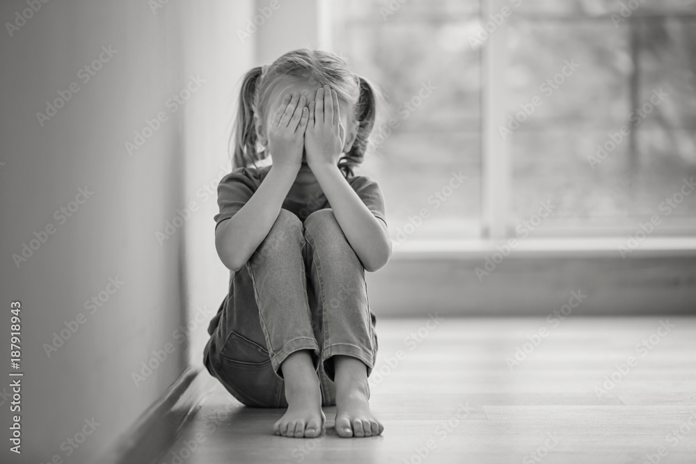 Sad Little Girl Sitting