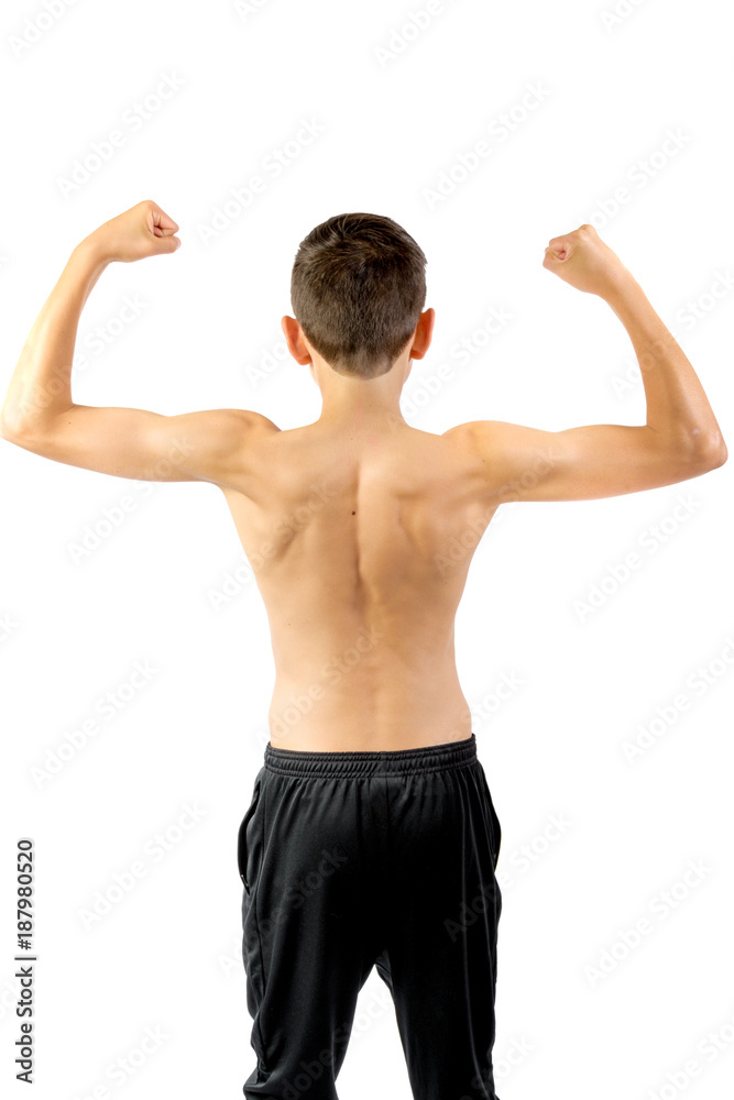 Shirtless teenage boy flexing his back muscles Stock Photo | Adobe Stock
