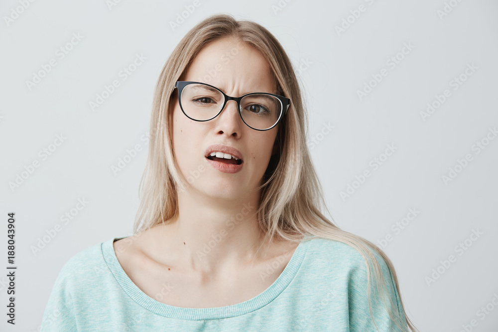 Foto de Attractive european female with slanting eyes and blonde long ...