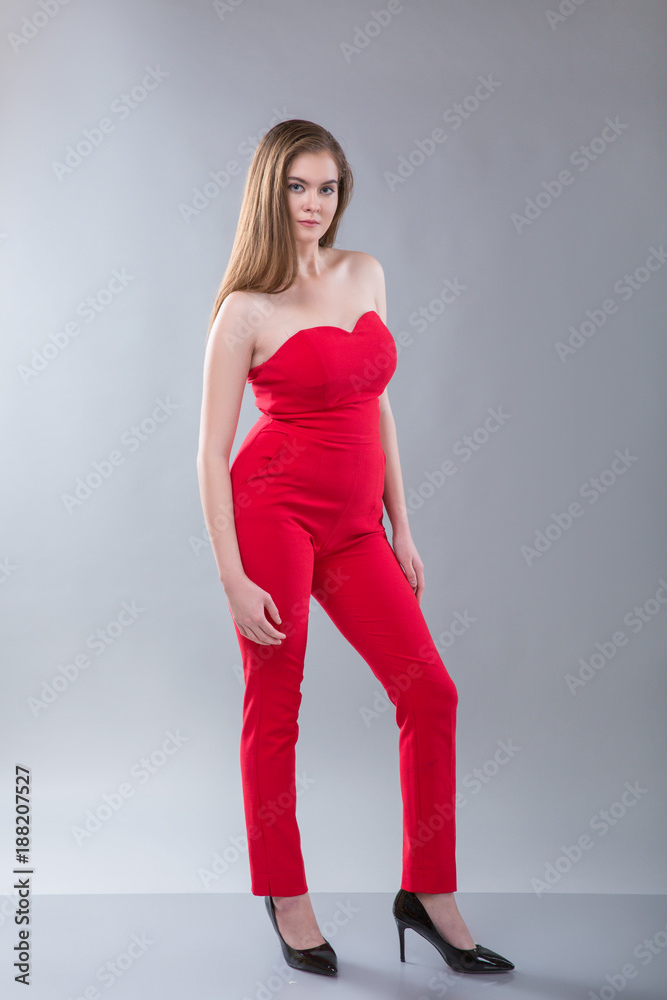 Young beautiful plus size model wearing in red costume, xl woman on ...