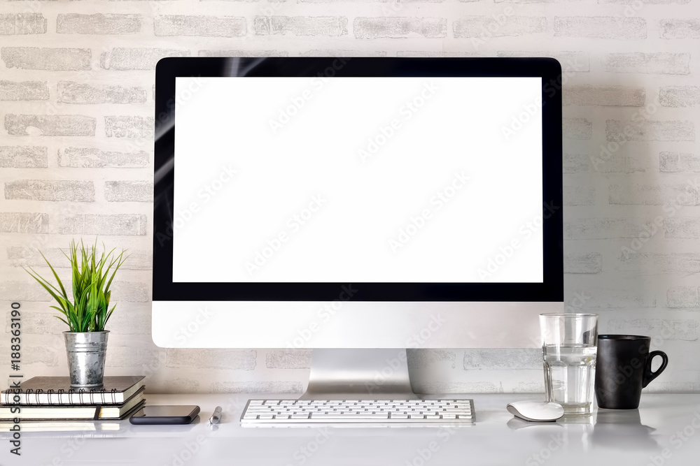 Modern clean workspace mockup with blank screen desktop computer and ...