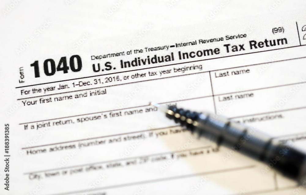 United States tax forms for the IRS. Stock Photo | Adobe Stock
