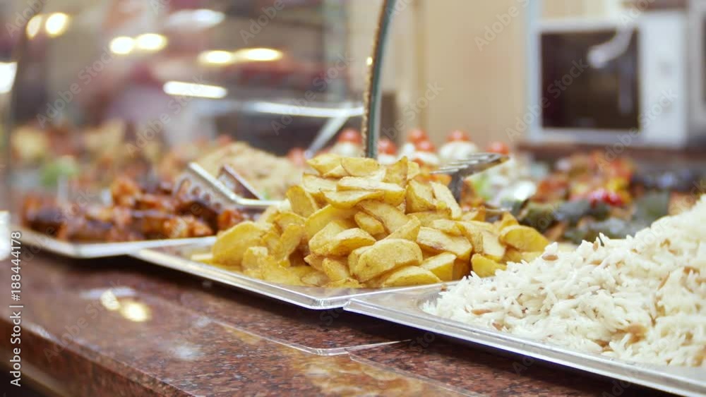 Salad Bar Buffet. dishes in the storefront. 4k, background blur. close ...