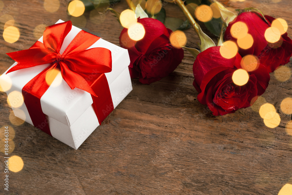 gift box with red roses Stock Photo | Adobe Stock