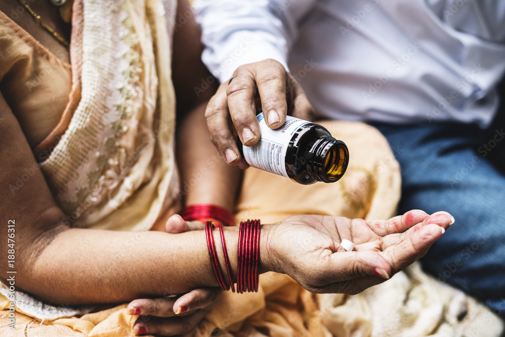 Indian people taking medicines Stock Photo | Adobe Stock